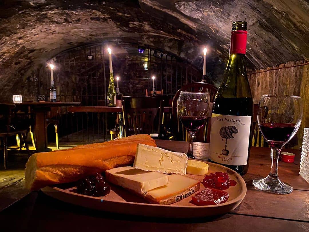 Sipping wine in an old London cellar – Tea Time Travels